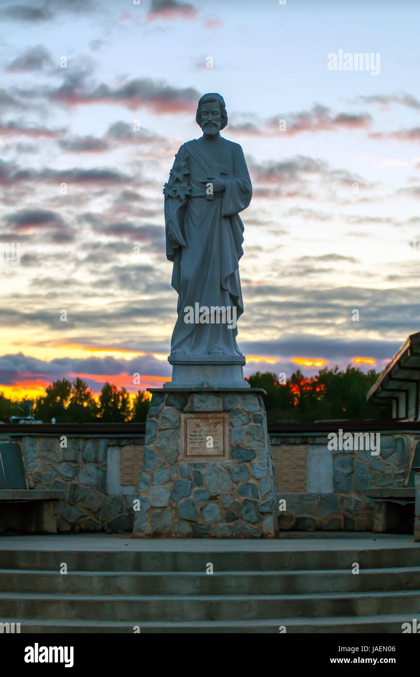 religious statue silhouette at sunset Stock Photo - Alamy