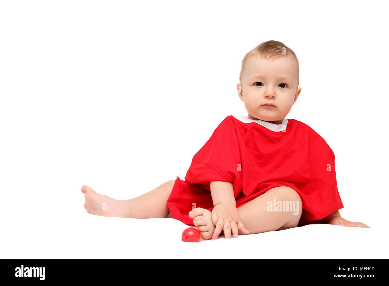 Child in red Stock Photo - Alamy