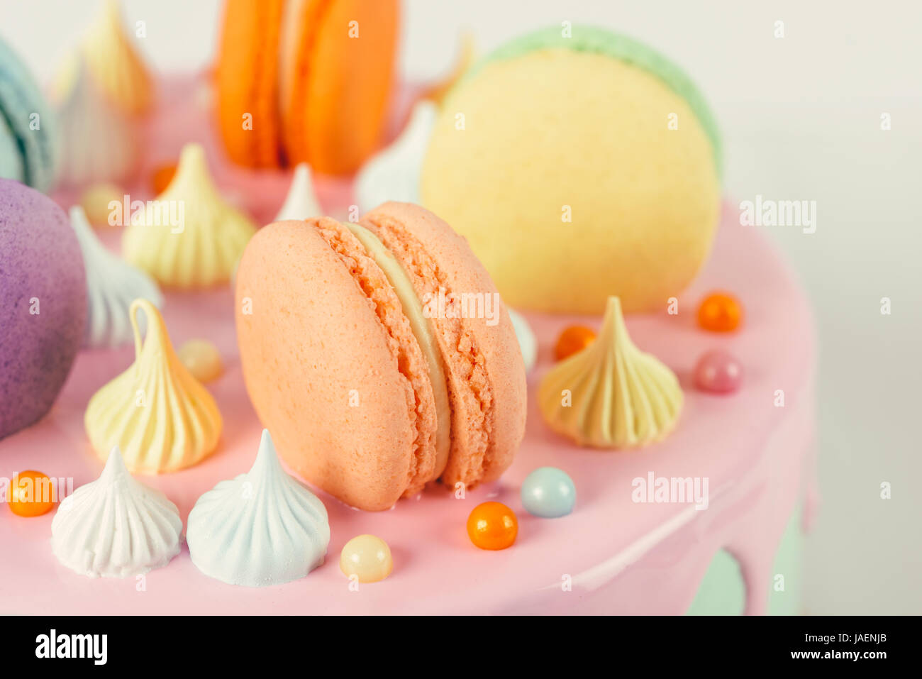 Colorful Macaron Birthday Cake And Sweet Candy Topping Stock Photo - Alamy