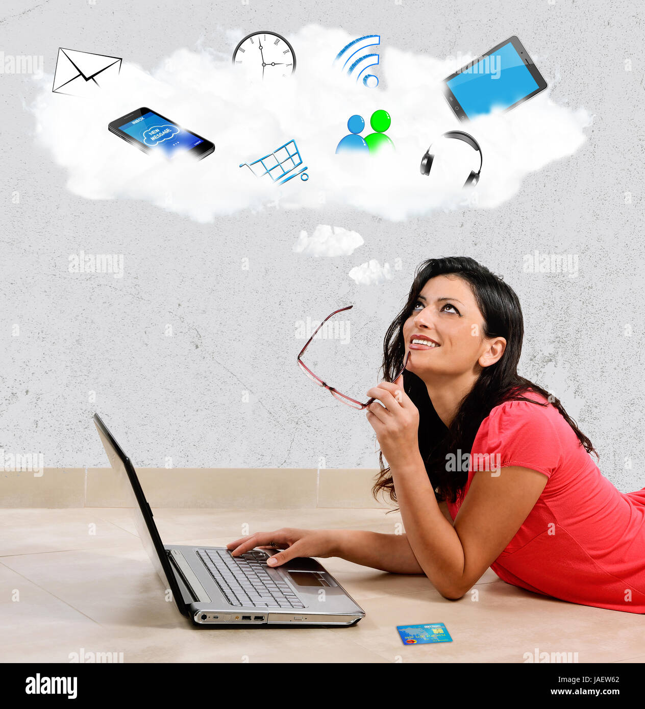 Beautiful Caucasian woman smiles thinking in front of his laptop ...