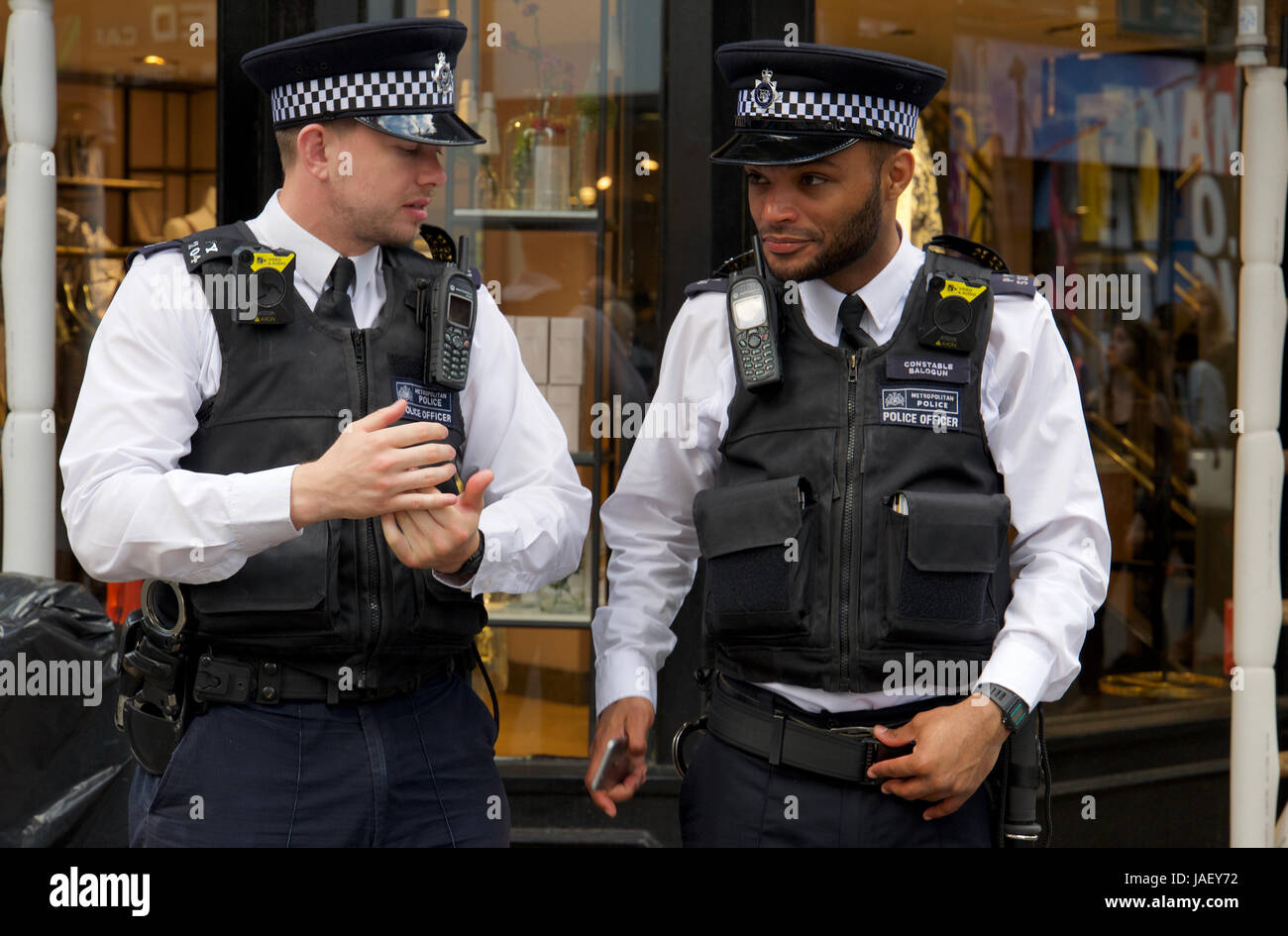 Police constables in conversation, Carnaby Street, London Stock Photo ...