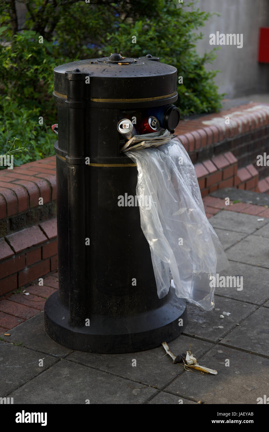 Overflowing bin hi-res stock photography and images - Alamy