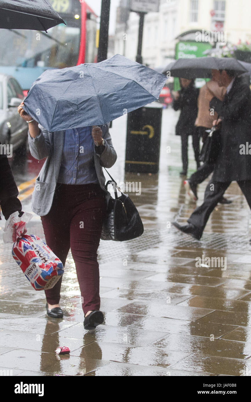 London UK. 6th June 2017. Commuters and pedestrians struggle against ...