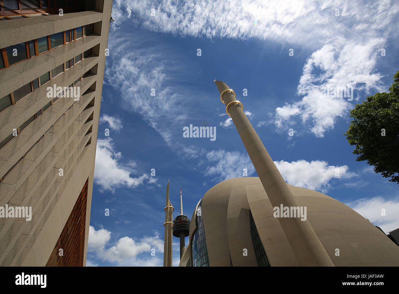 Cologne, Germany. 6th June, 2017. Clouds over of the mosque of the ...