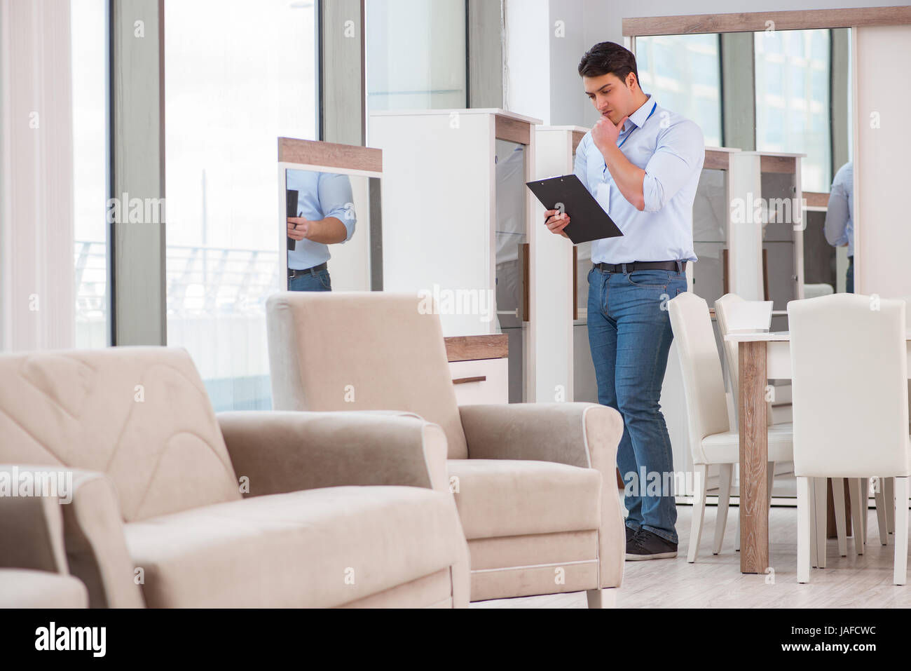 Salesperson customer serious hi-res stock photography and images - Alamy