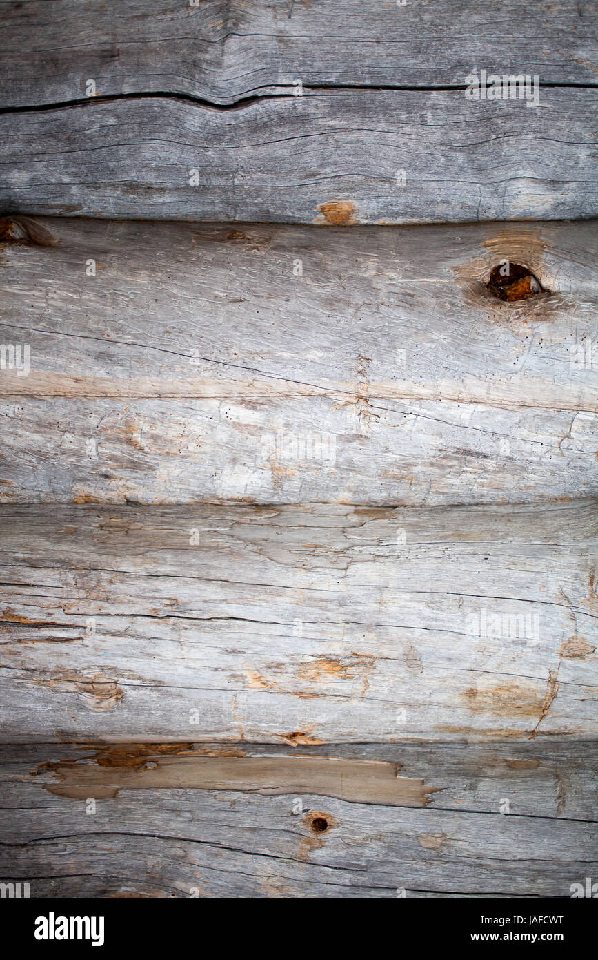 Building wall made from snag, dead wood Stock Photo - Alamy
