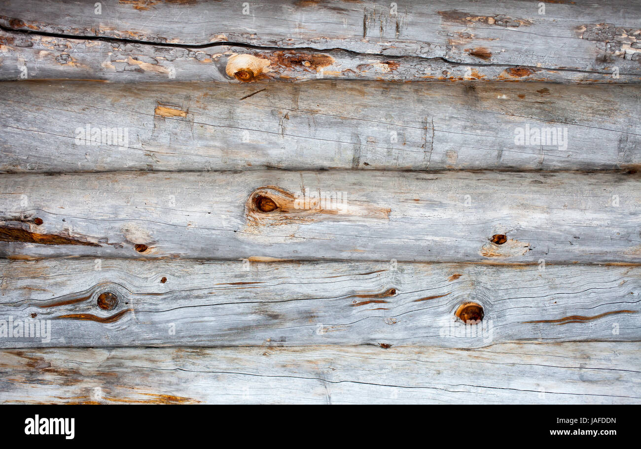 Building wall made from snag, dead wood Stock Photo - Alamy