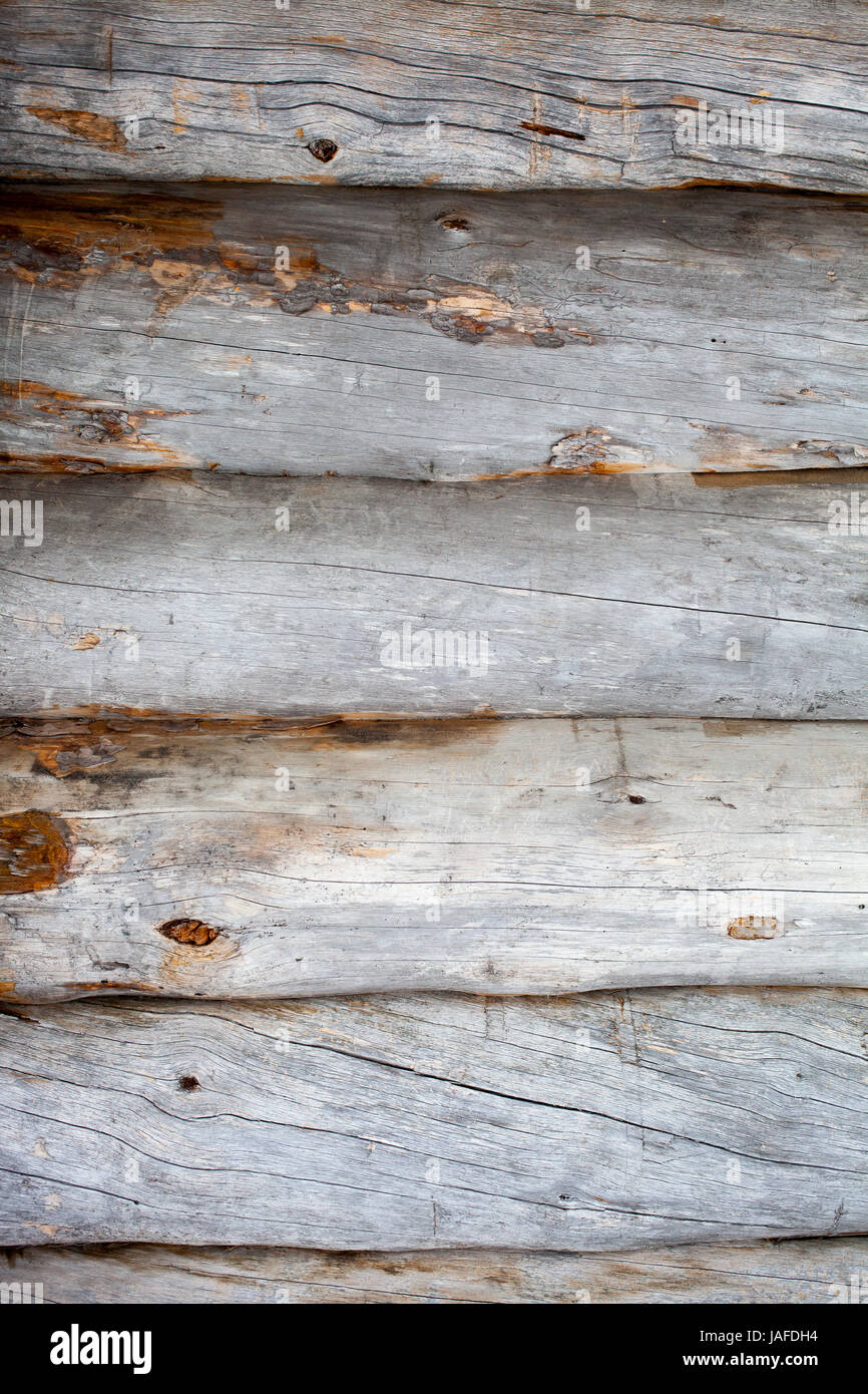 Building wall made from snag, dead wood Stock Photo - Alamy