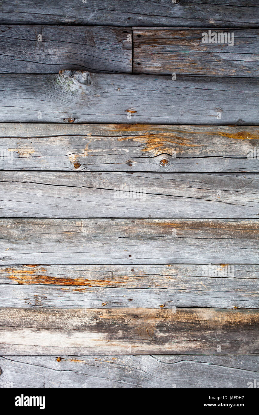Building wall made from snag, dead wood Stock Photo - Alamy