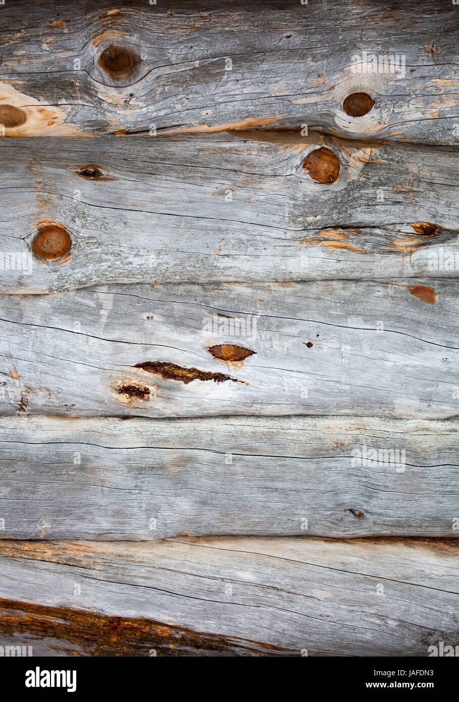 Building wall made from snag, dead wood Stock Photo - Alamy