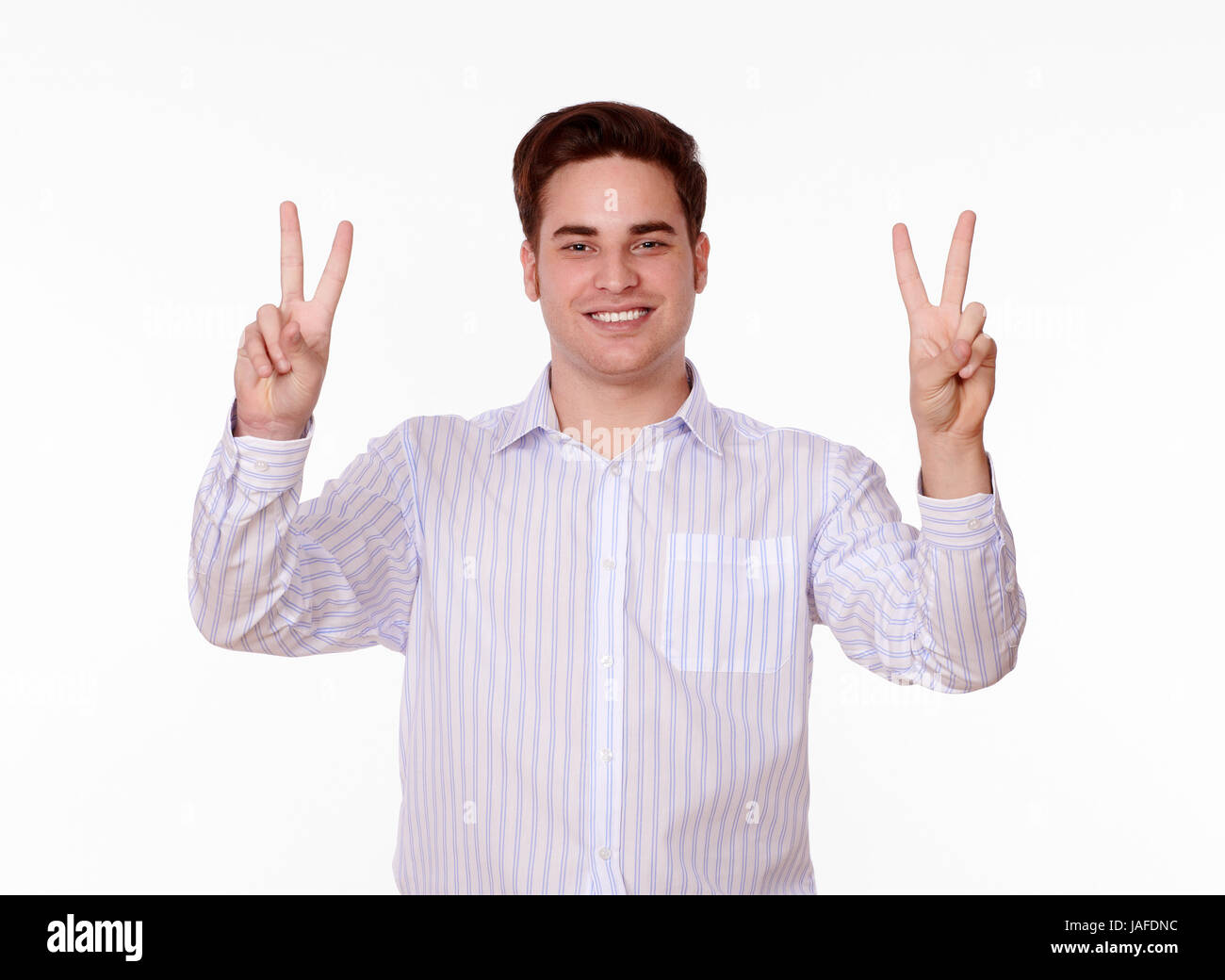 Portrait of an adult charming man celebrating his victory with two ...