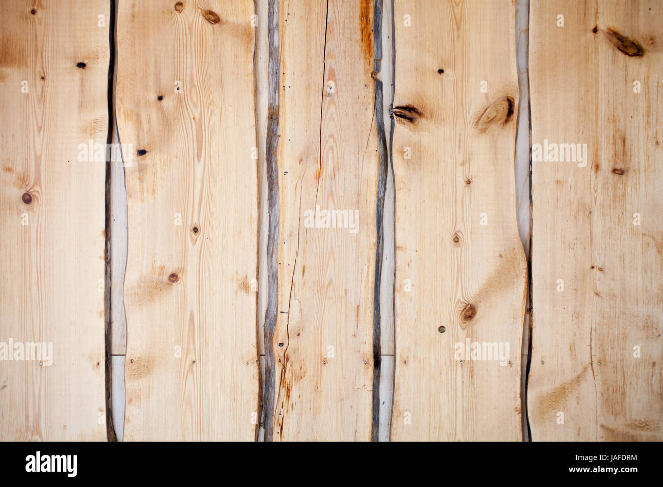 Building wall made from snag, dead wood Stock Photo - Alamy
