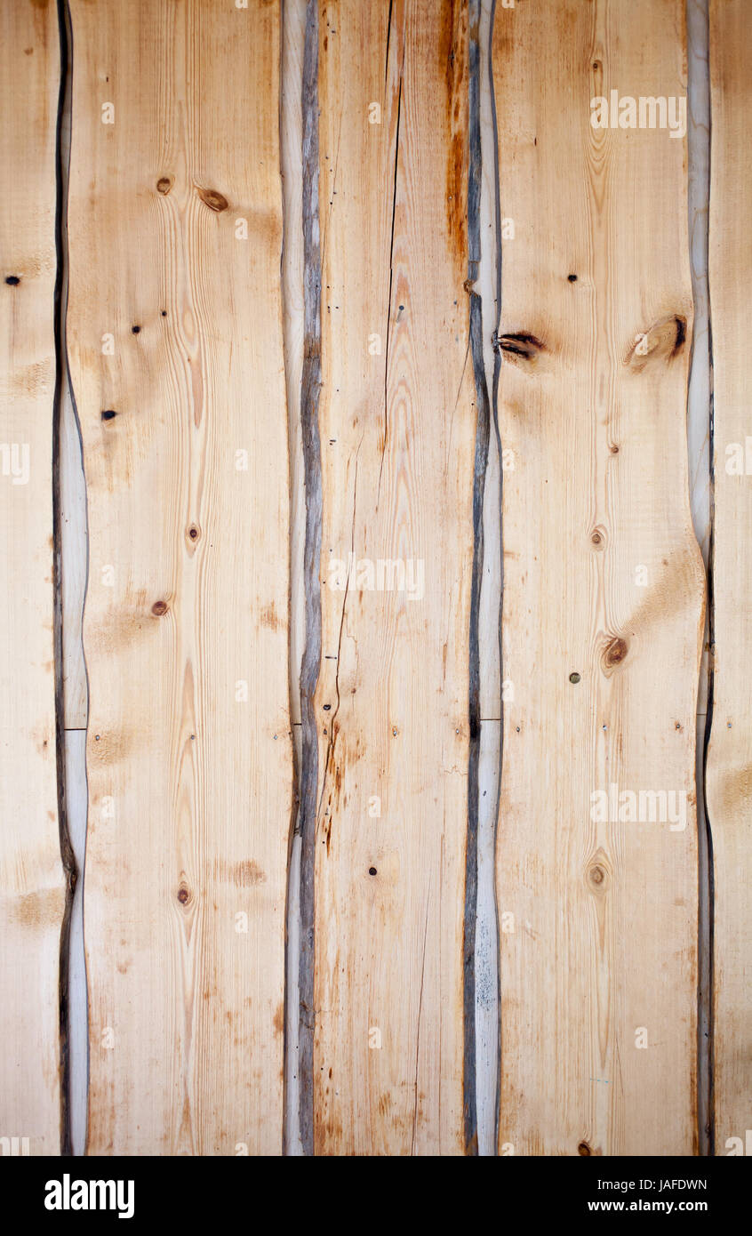Building wall made from snag, dead wood Stock Photo - Alamy