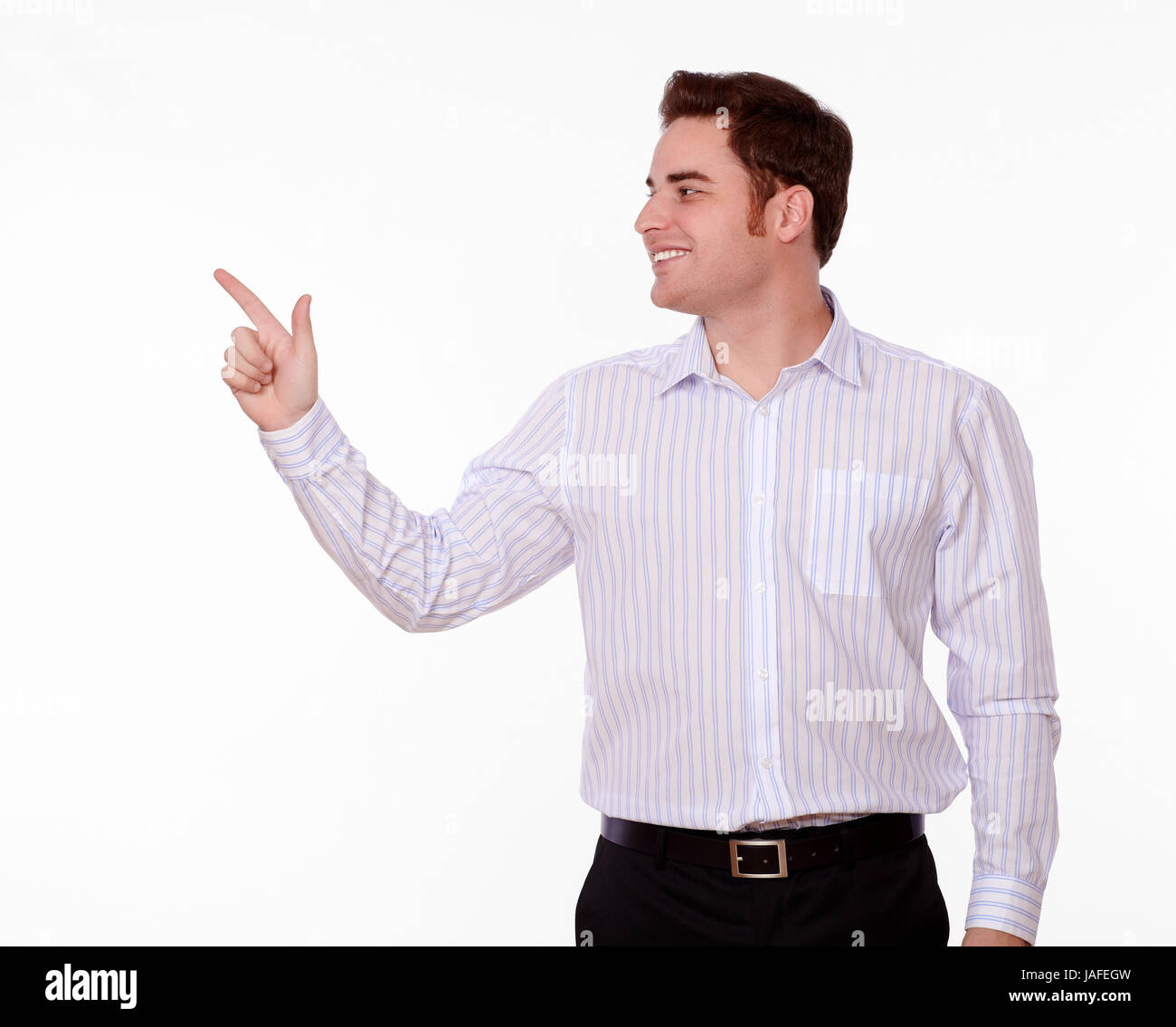 Portrait of an attractive caucasian man pointing to his right while ...