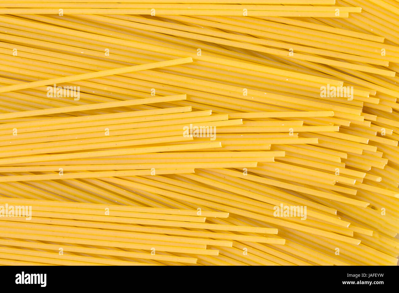 Background texture of pasta spaghetti raw close-up Stock Photo - Alamy