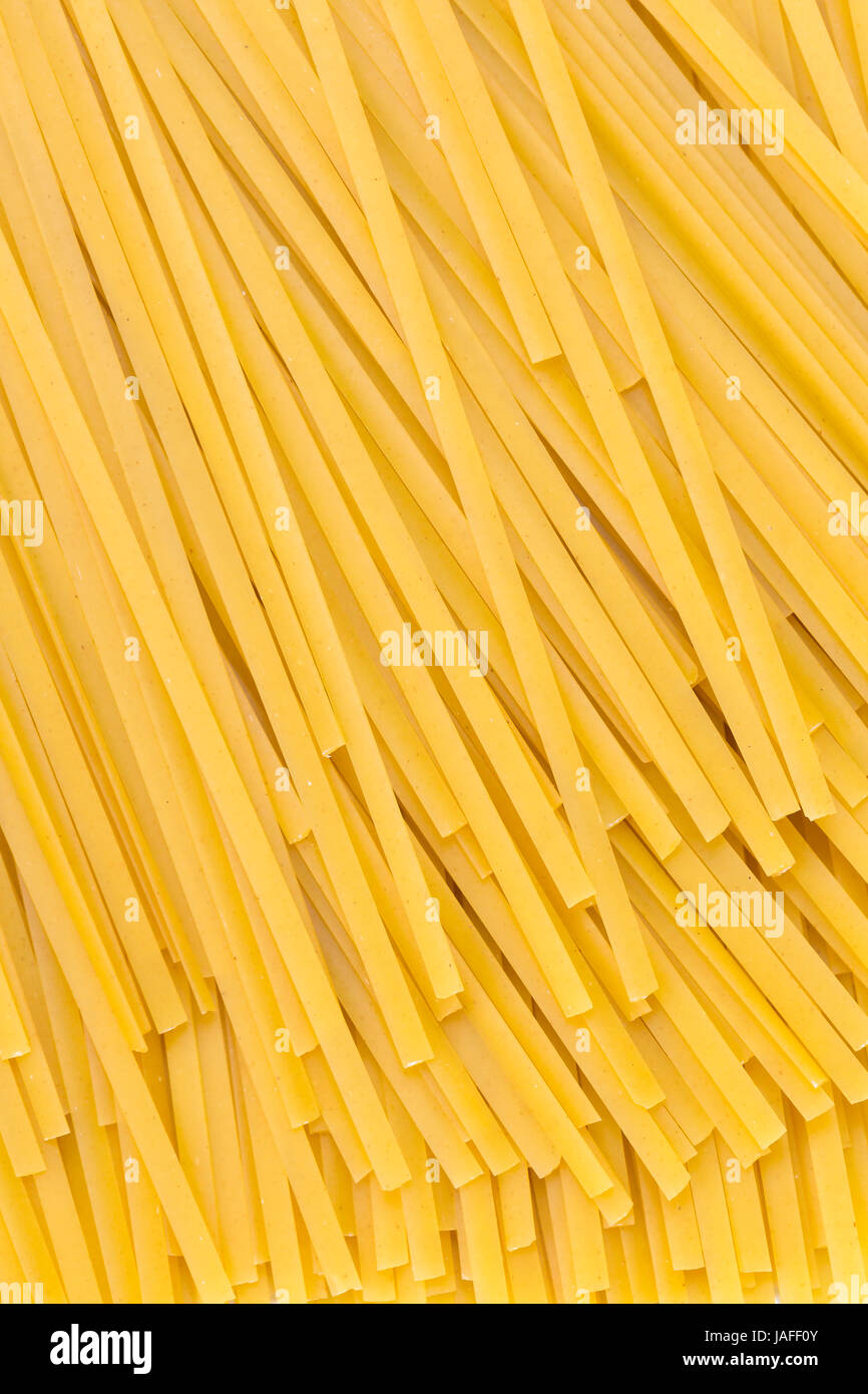 Background texture of pasta spaghetti raw close-up Stock Photo - Alamy