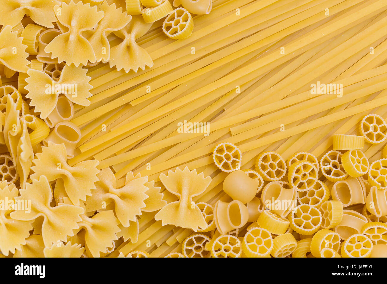 Background texture of pasta spaghetti raw close-up Stock Photo - Alamy