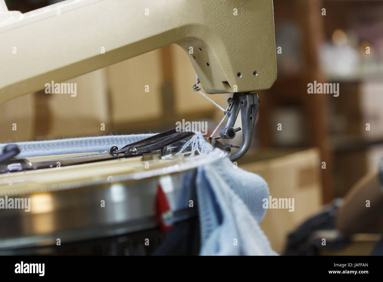 Image of semi-automatic machine for knitting clothes Stock Photo - Alamy