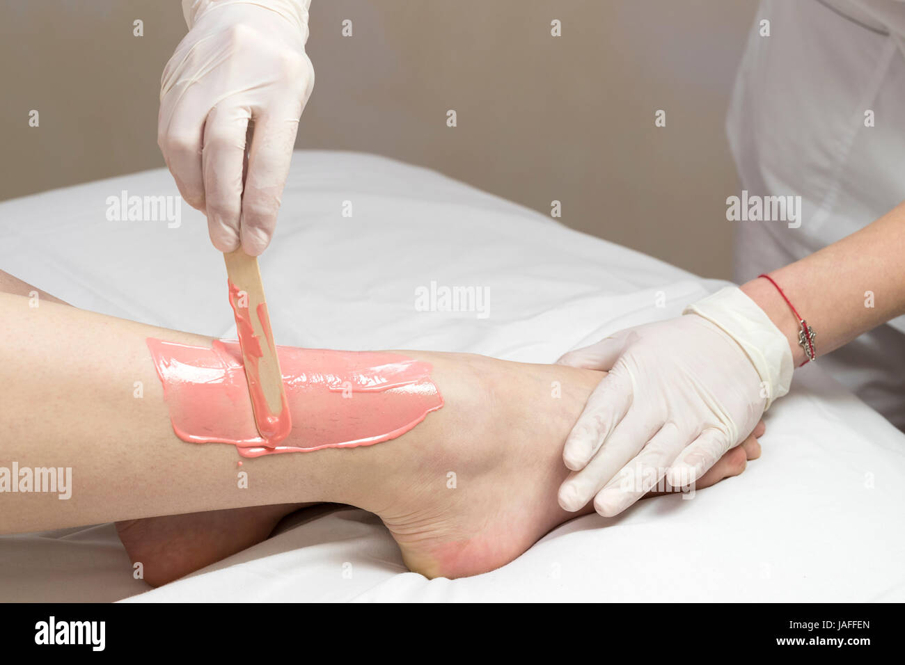 Process depilation female legs and hands in a beauty salon Stock Photo ...