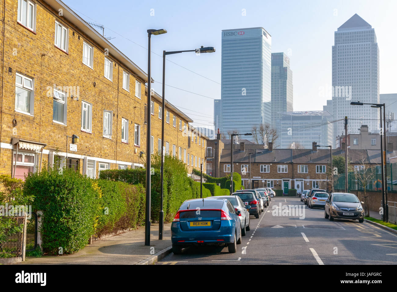 London, UK - March 27, 2017 - English terrace houses in contrast to ...