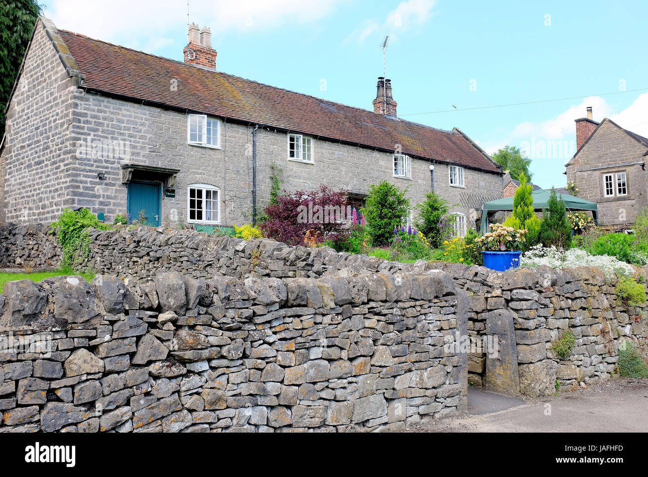 Tissington, Derbyshire, UK. May 31, 2017. The village pond and green in ...