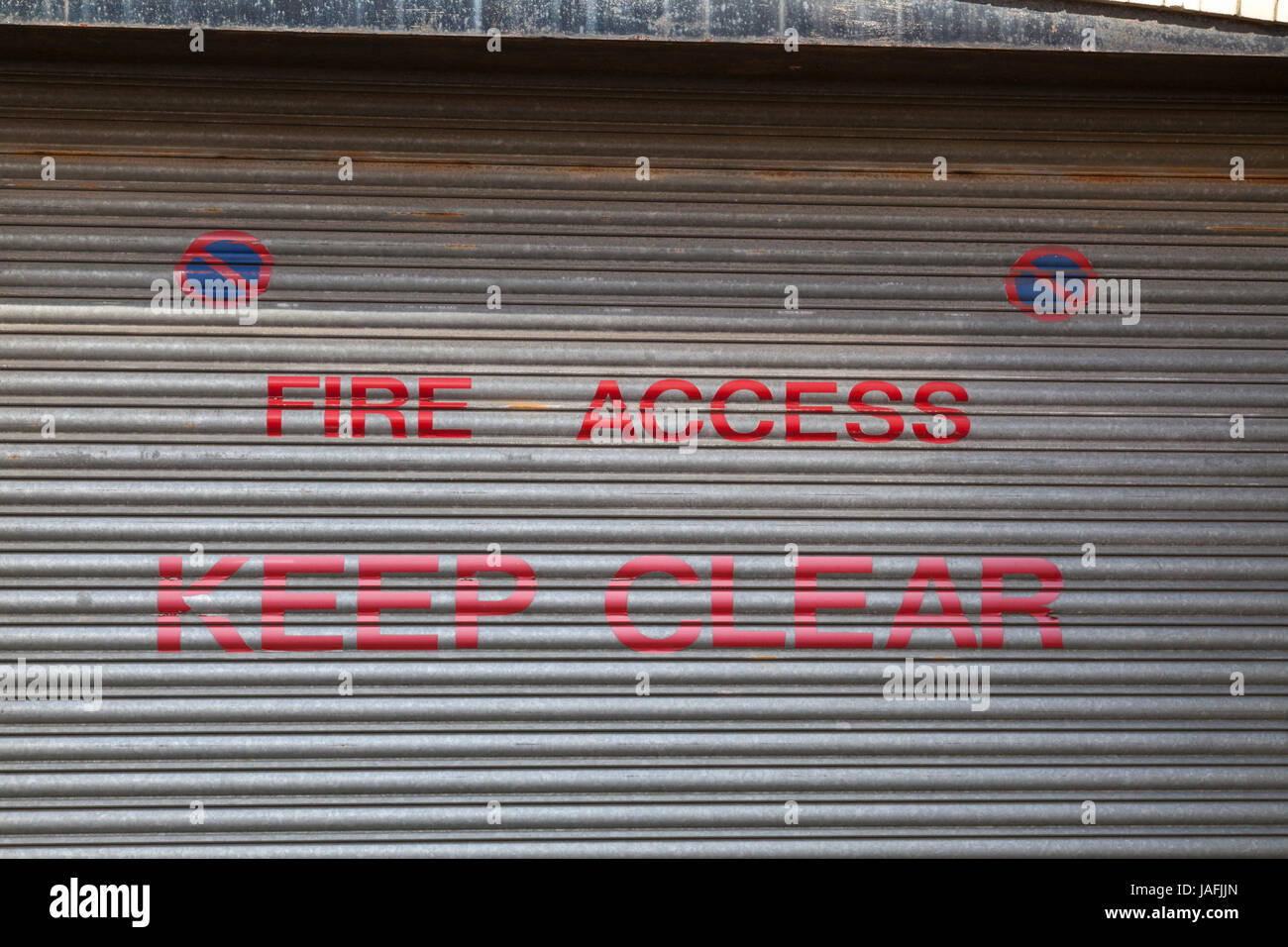 Fire access keep clear metal railings no access signage hi-res stock ...
