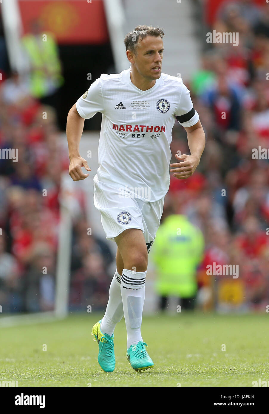 Carrick All Stars' Phil Neville Stock Photo - Alamy