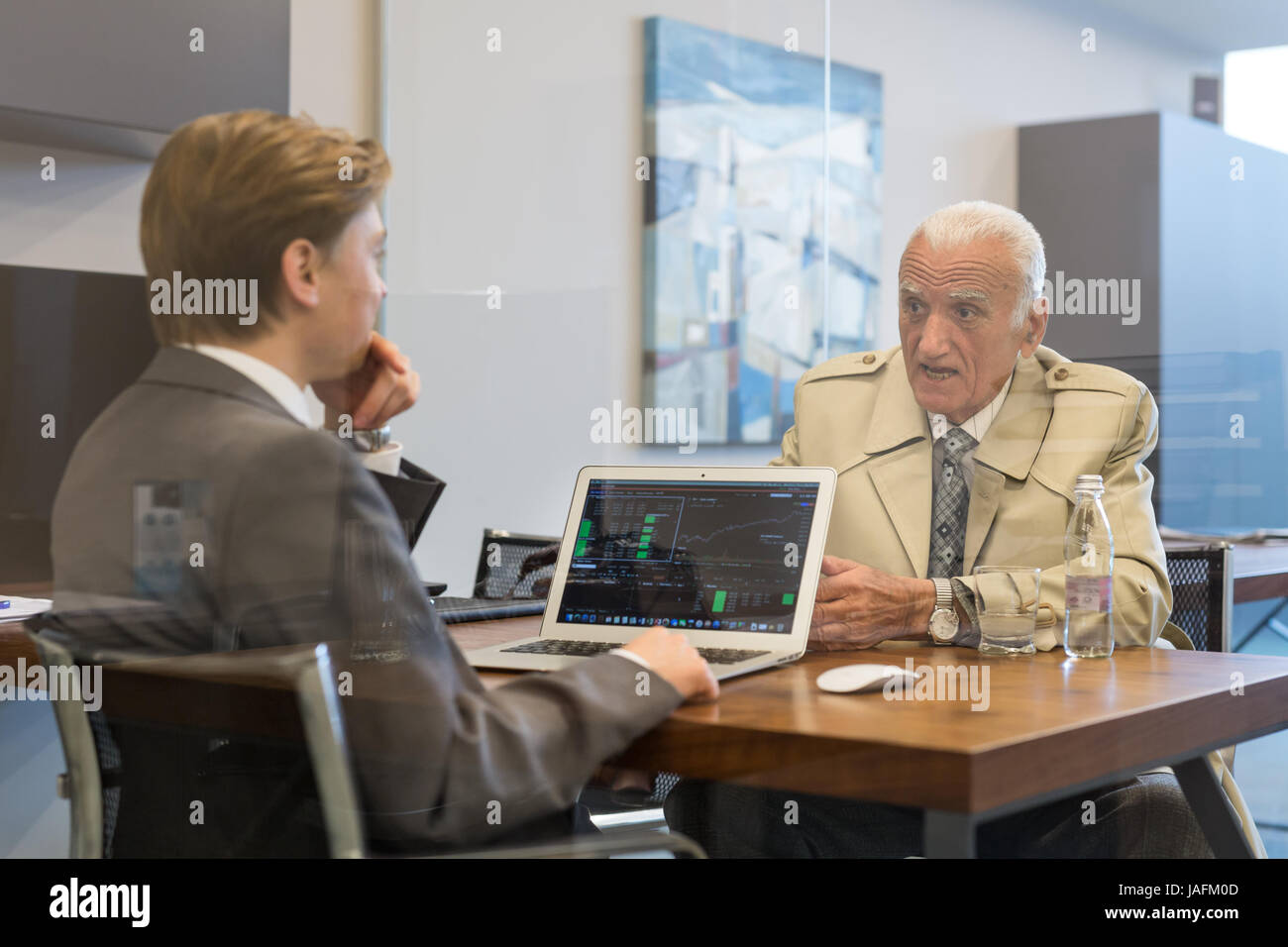 Senior Executive Looking Laptop High Resolution Stock Photography and ...