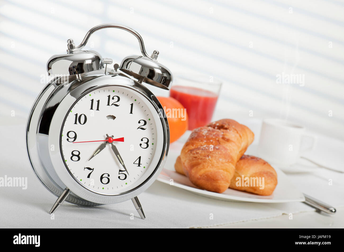 alarm clock at half past seven with continental breakfast in the ...