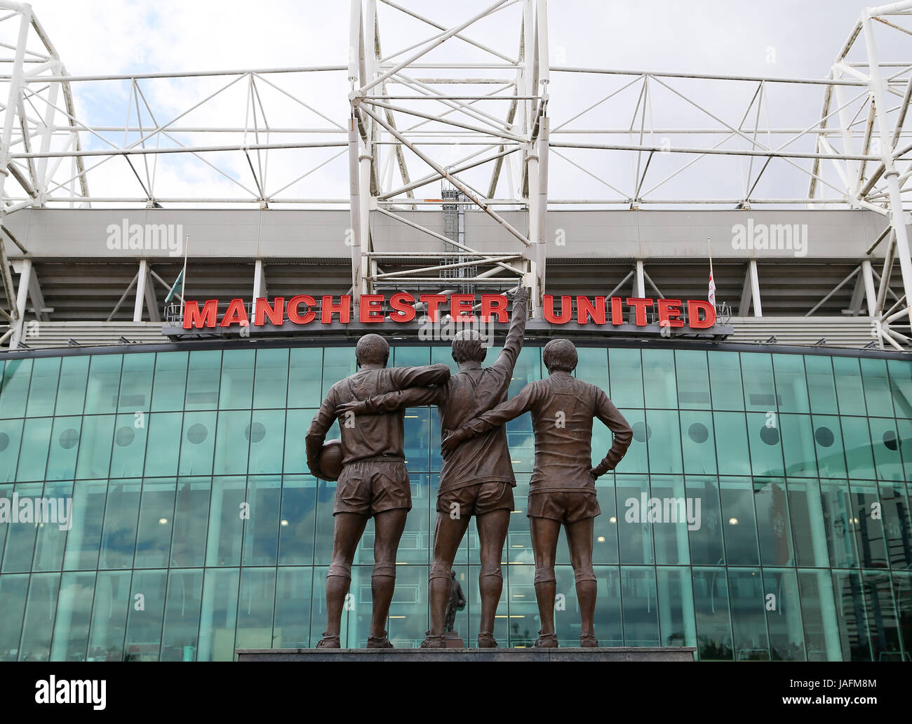 A statue of Manchester United's 'Holy Trinity' of Sir Bobby Charlton ...