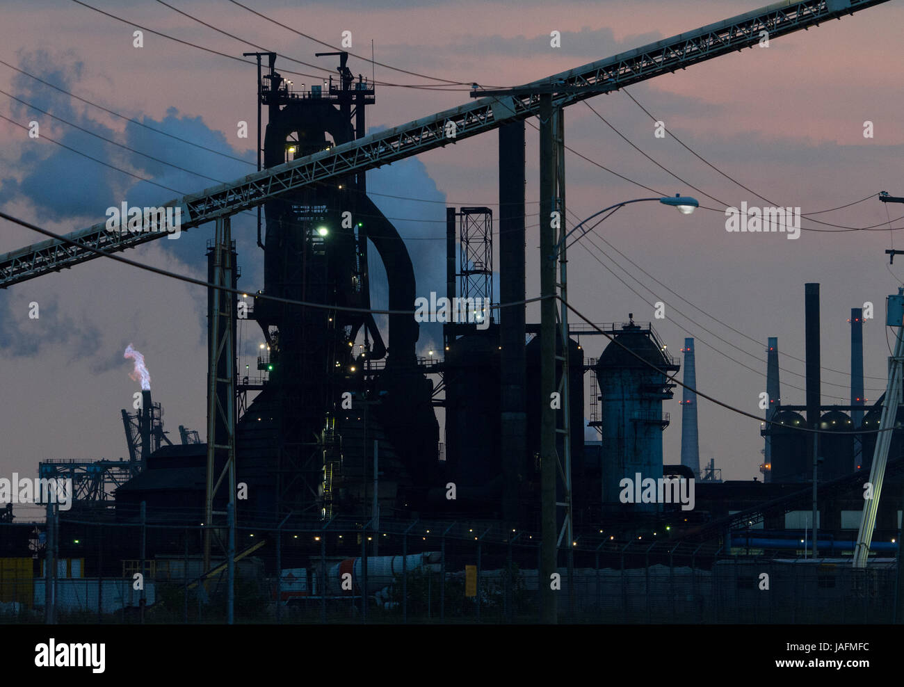 A blast furnace on Zug Island as night falls Stock Photo - Alamy