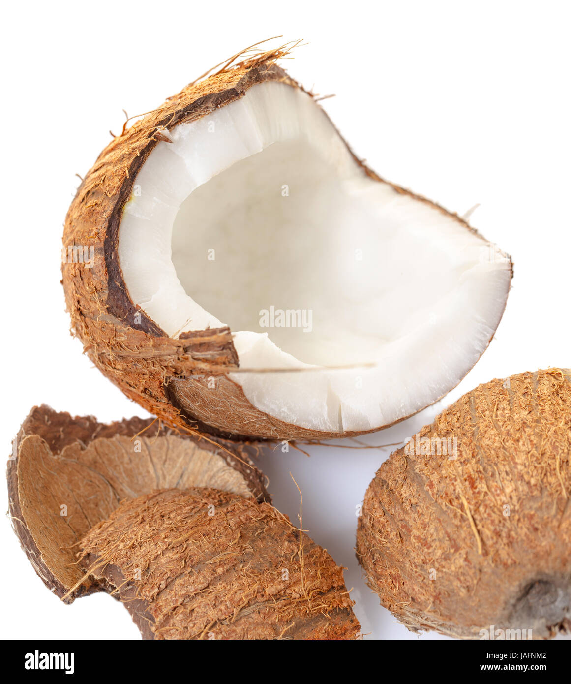 Chopped coconut close-up on white isolated background Stock Photo - Alamy
