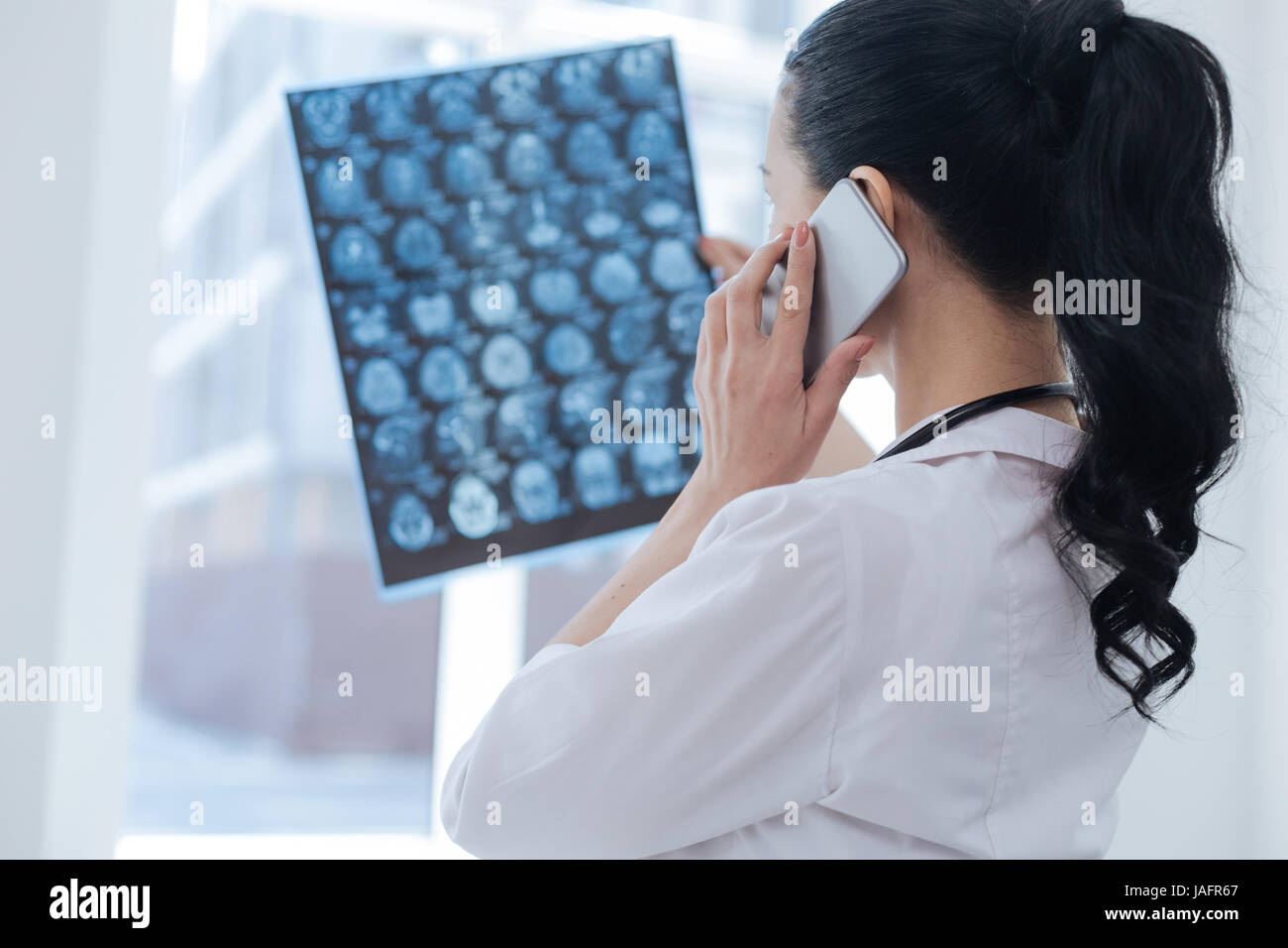 Monitoring health changes. Professional involved female oncologist ...