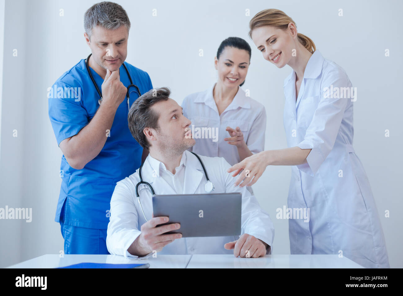 Enjoying being healthcare professionals. Positive happy mature ...
