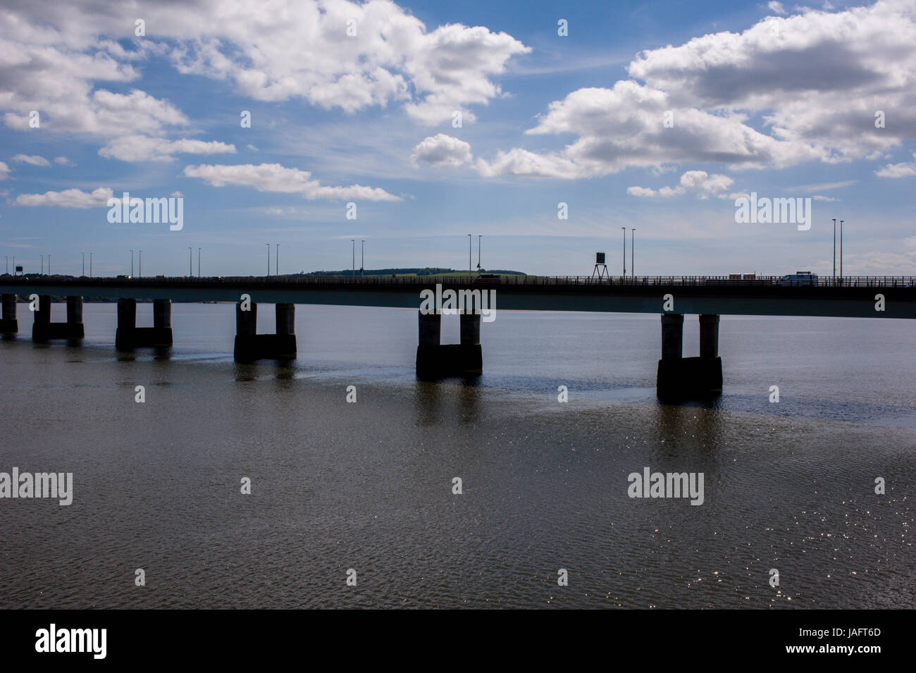The Tay Road Bridge as seen from the north bank of the estuary of the ...
