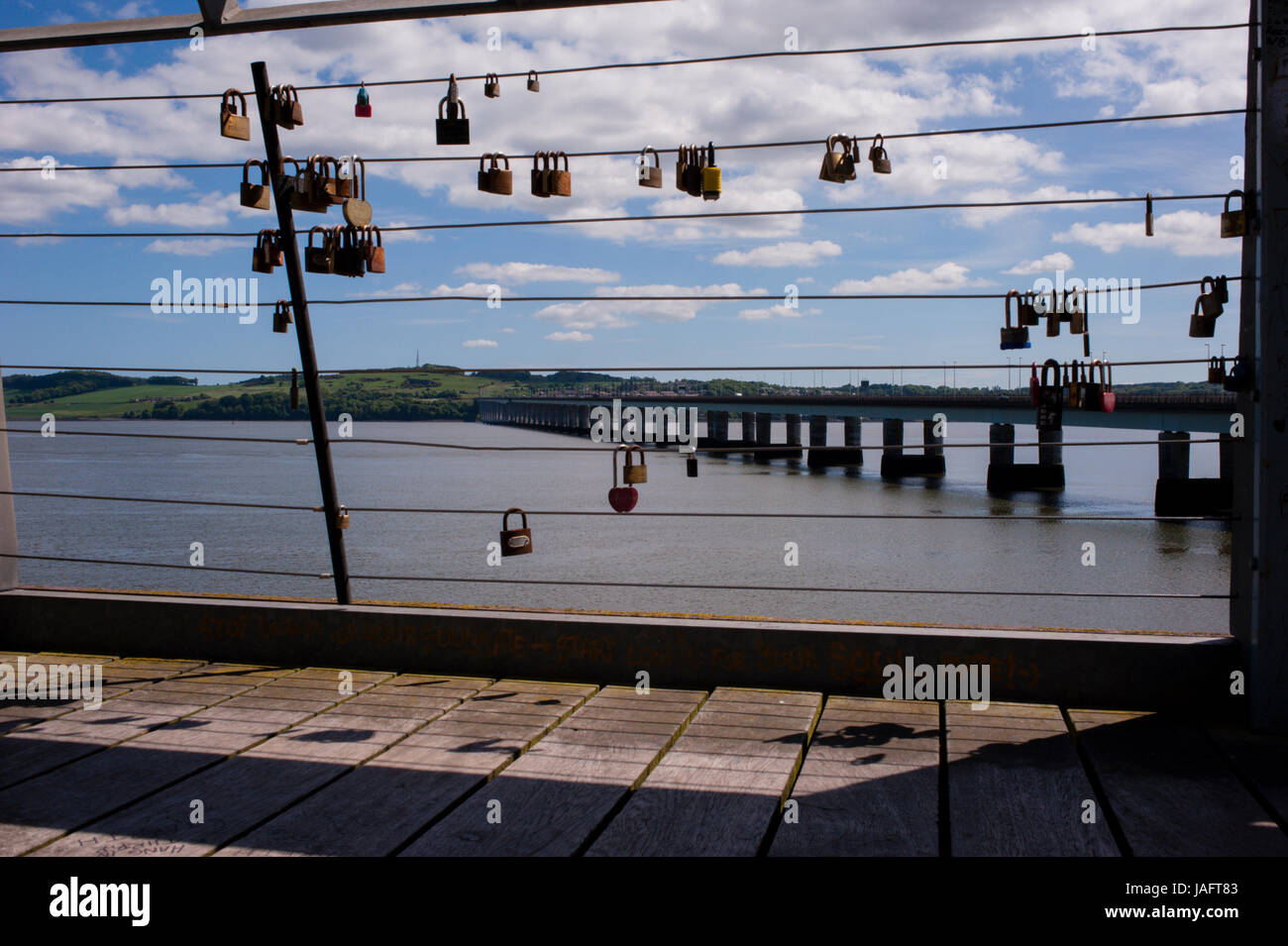 The Tay Road Bridge as seen from the north bank of the estuary of the ...