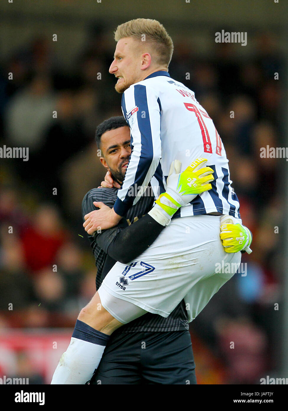 Milwall's Byron Webster celebrates with goalkeeper Jordan Archer Stock ...