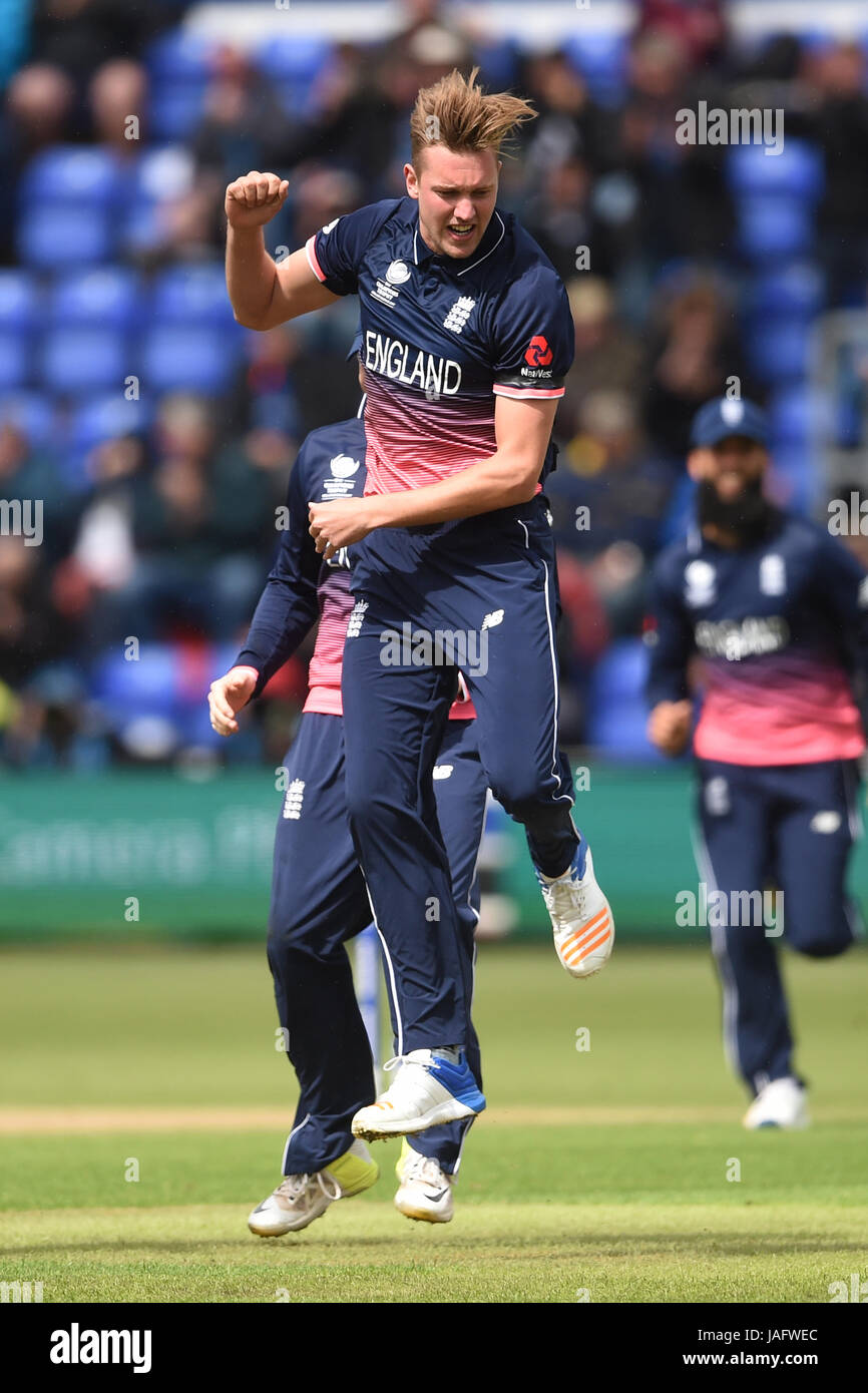 England's Jake Ball celebrates taking the wicket of New Zealand's Luke ...