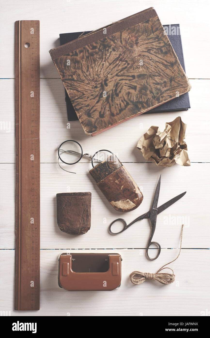 Personal stuff against wooden background Stock Photo - Alamy