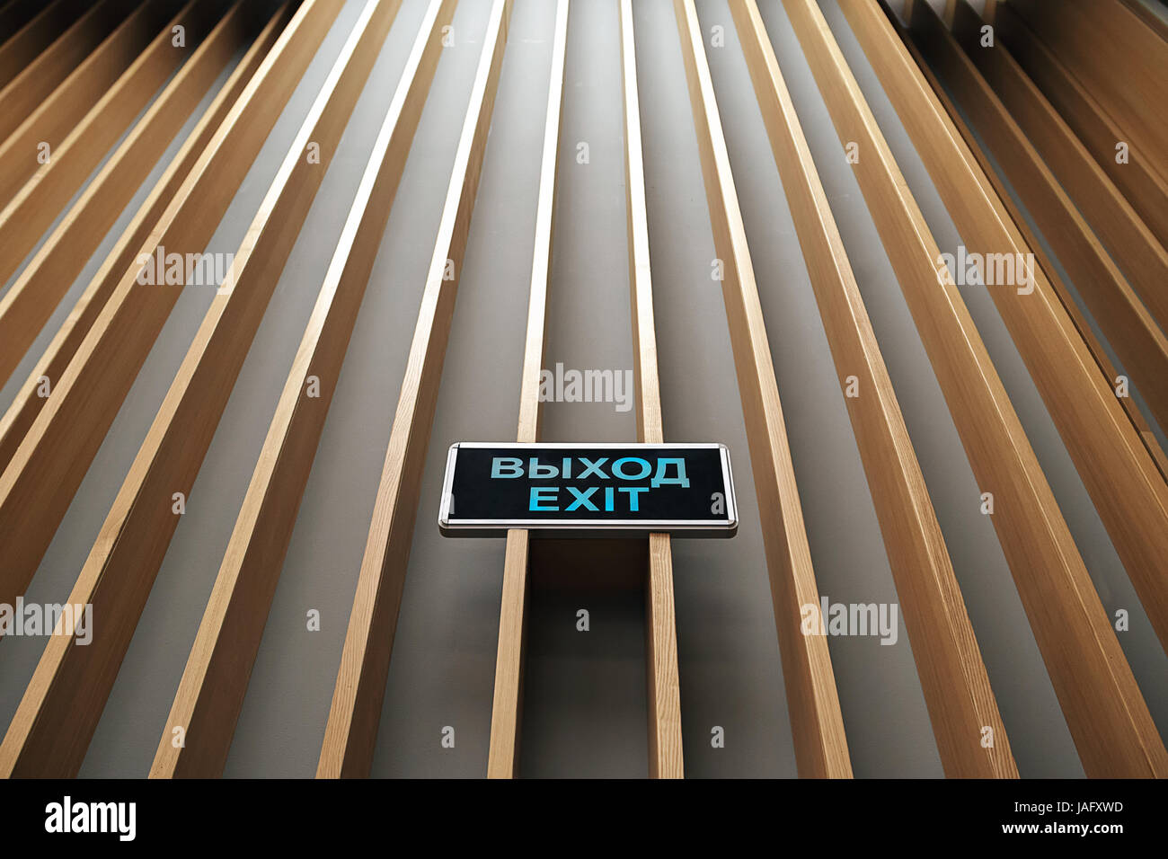 stainless steel Label Exit messages Closeup with blurred room or hall ...