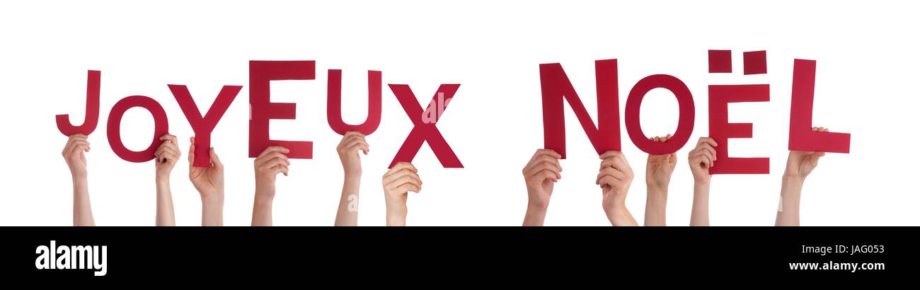 Many Hands Holding the French Words Joyeux Noel Which Means Merry ...