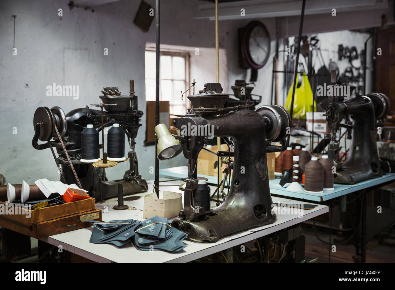 Sewing machines in a shoemaker's workshop Stock Photo - Alamy