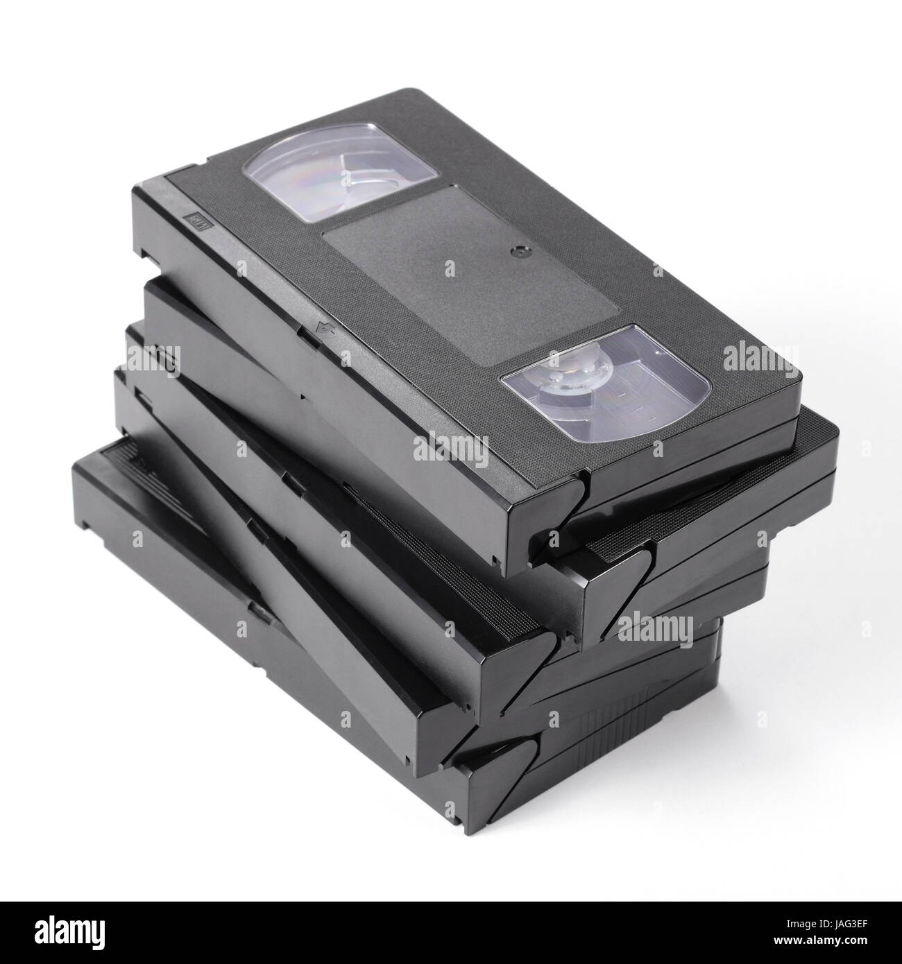 Pile of vintage VHS videotapes on a white background Stock Photo - Alamy