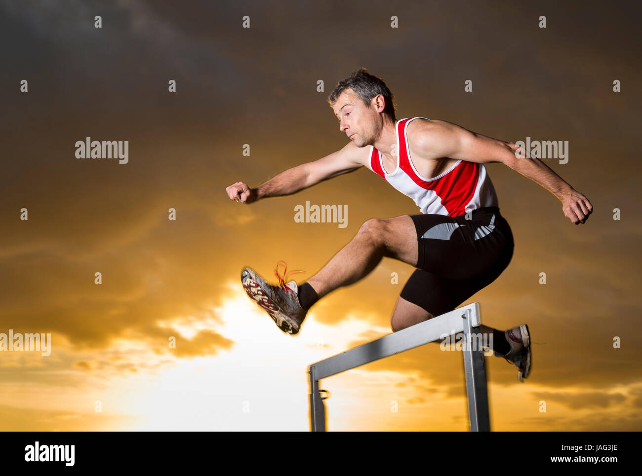 Hurdling athletics hi-res stock photography and images - Alamy