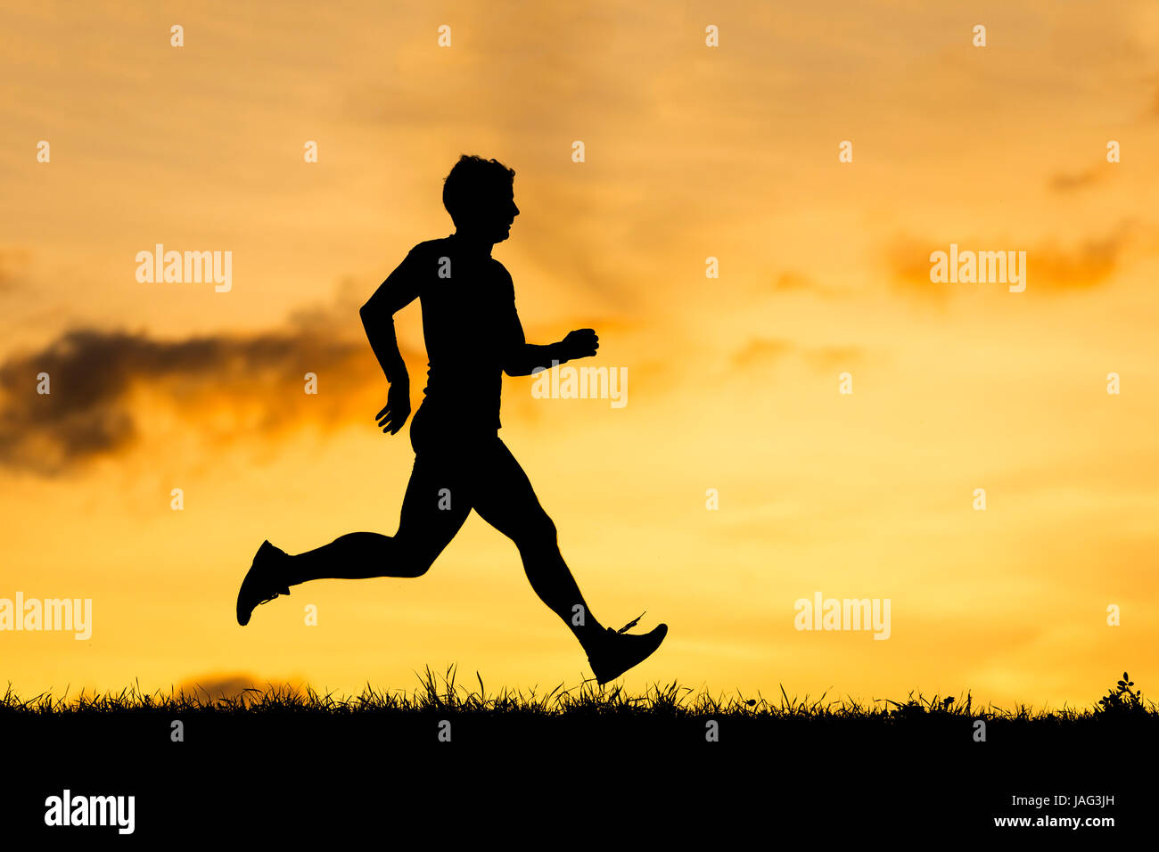 silhouette of a jogger in sunset Stock Photo - Alamy