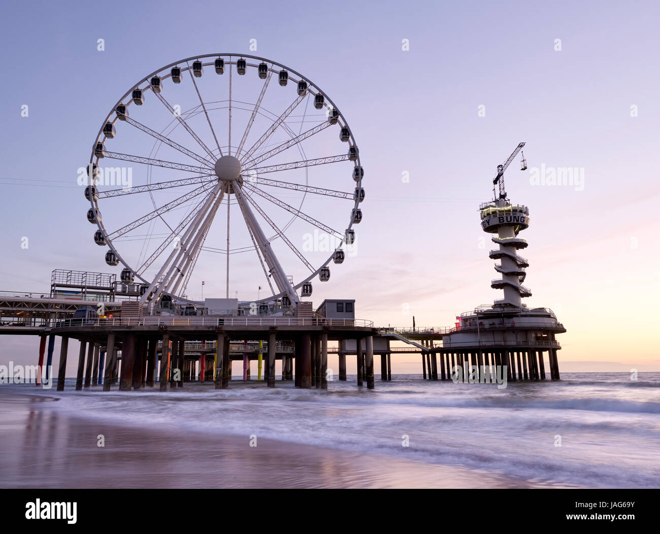 The pier with ferris wheel during sunset, The Hague Beach, Scheveningen ...