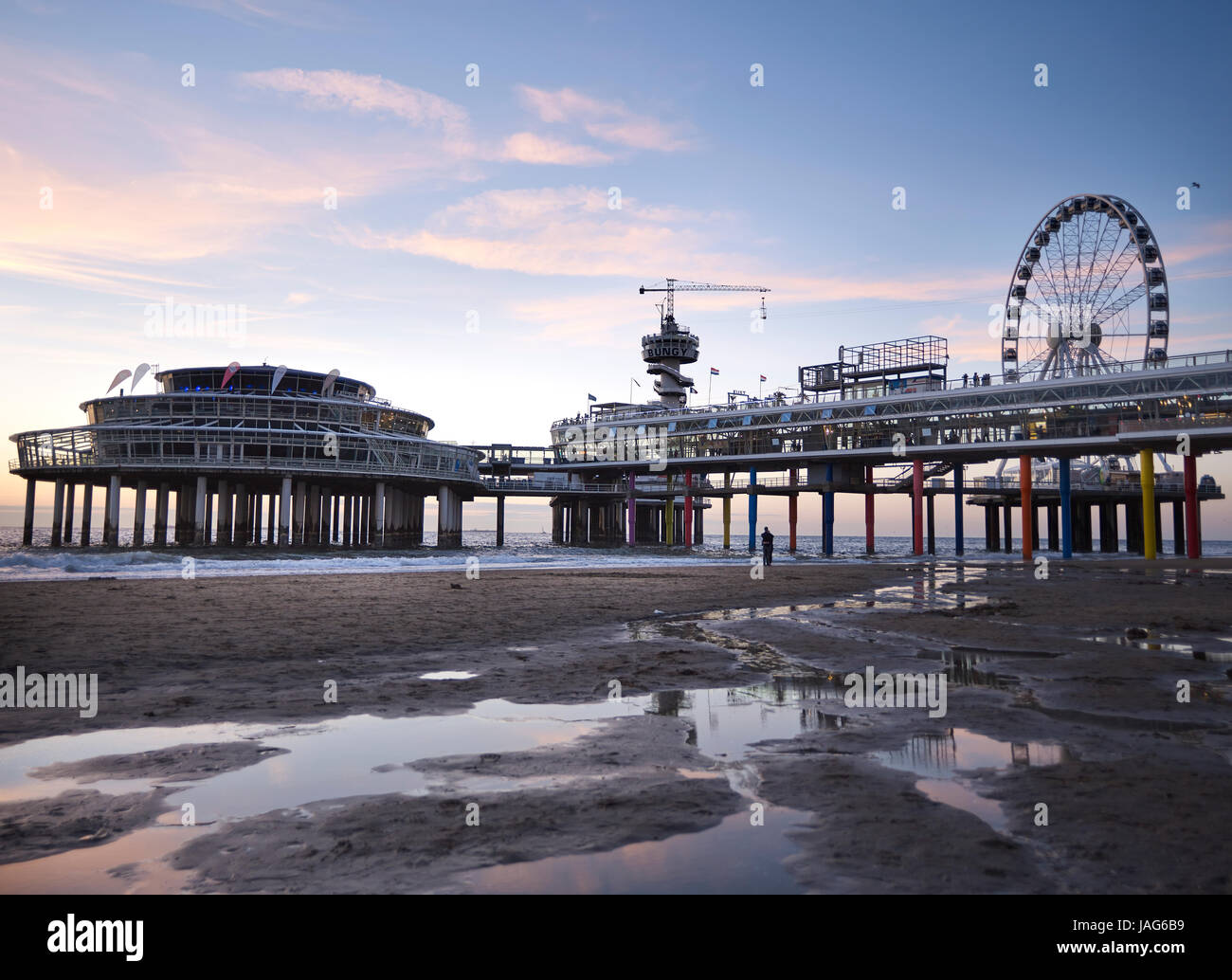 The pier with ferris wheel during sunset, The Hague Beach, Scheveningen ...