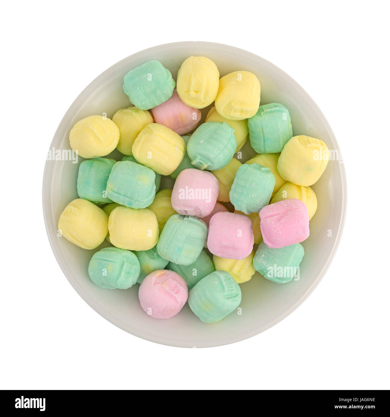 Top view of after dinner mint candies filling a bowl isolated on a ...