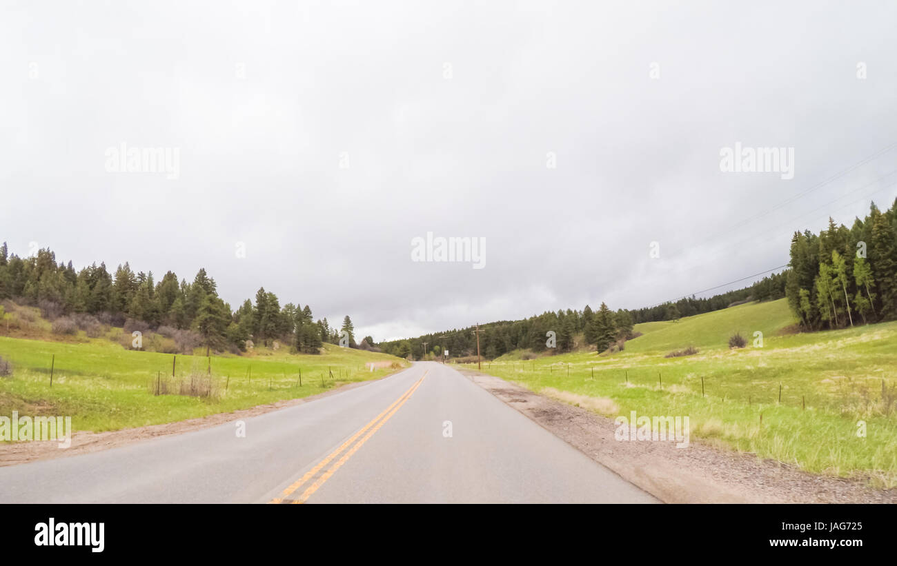 Driving on small paved road in rural mountain area Stock Photo - Alamy