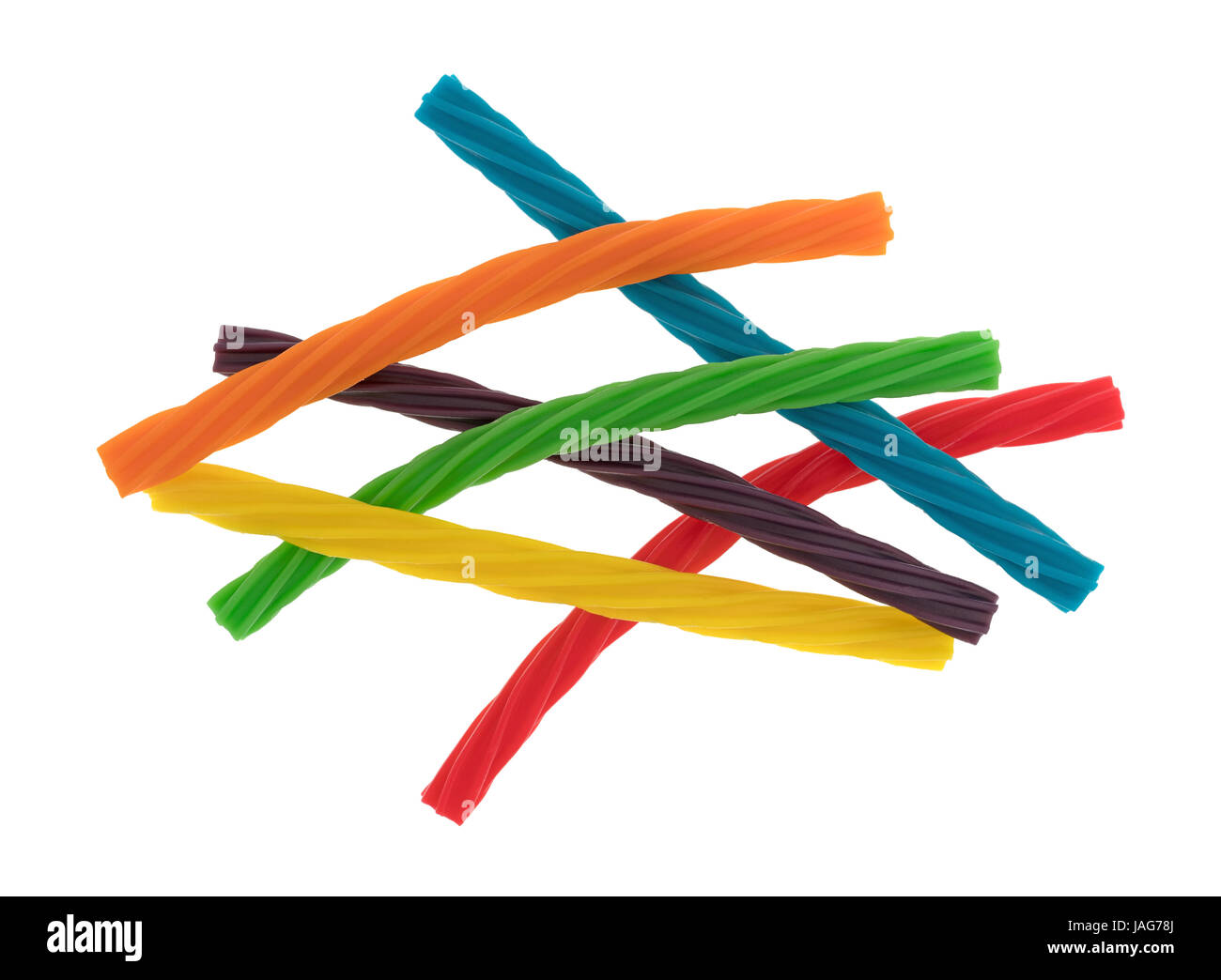 Top view of a group of colorful spiral licorice sticks isolated on a ...